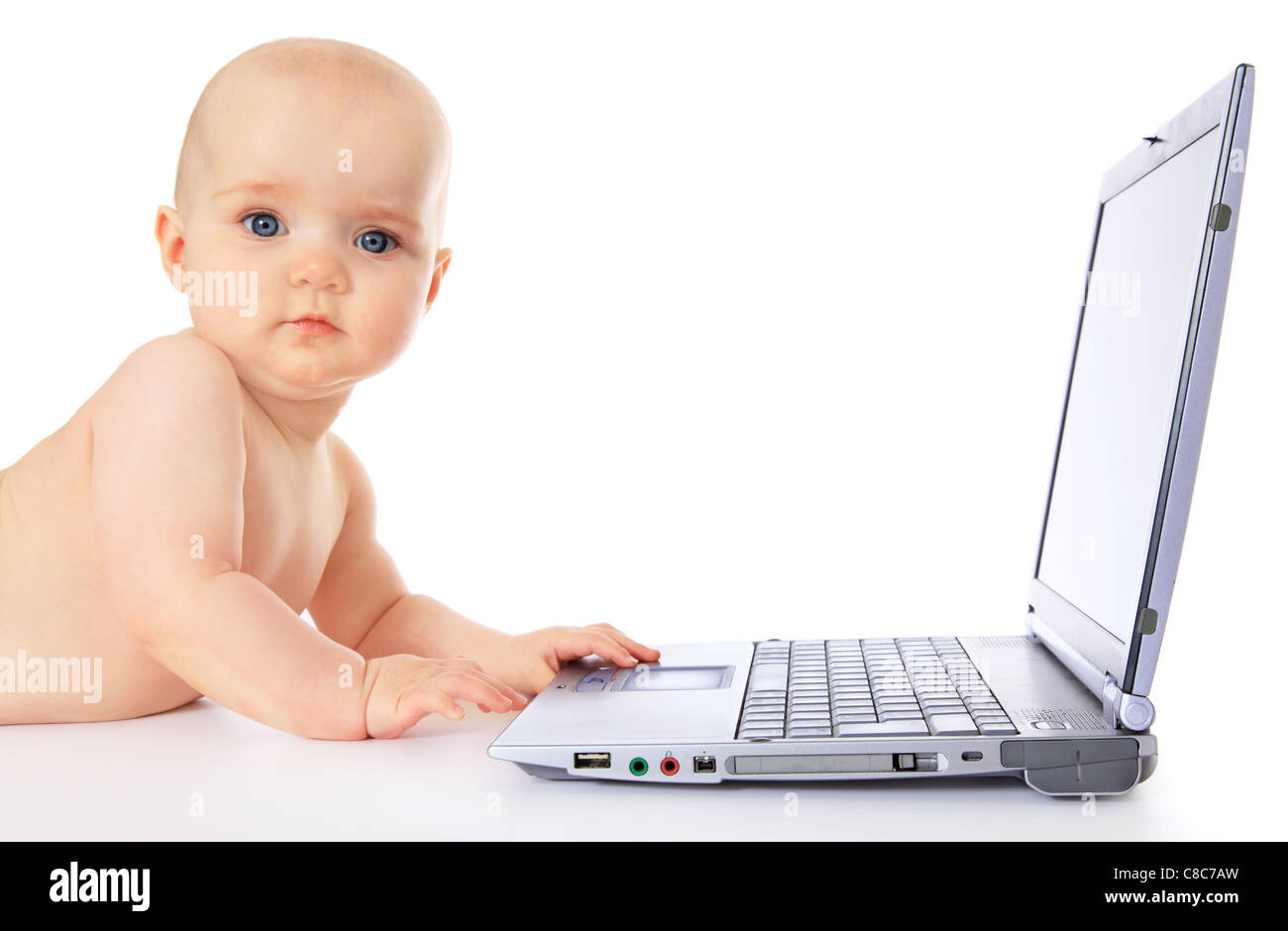 Cute little baby playing with laptop. All on white background Stock ...