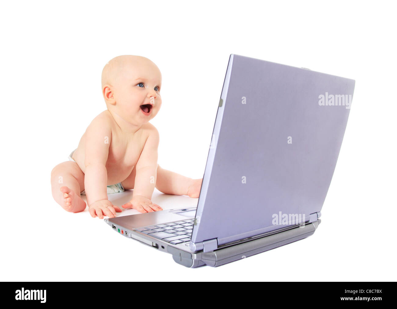 Cute little baby playing with laptop. All on white background Stock ...