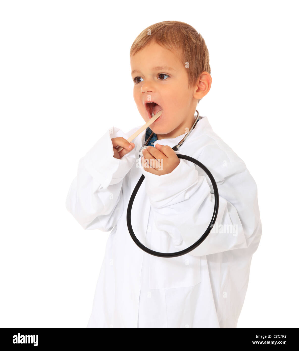 Cute caucasian boy playing doctor. All on white background Stock Photo ...