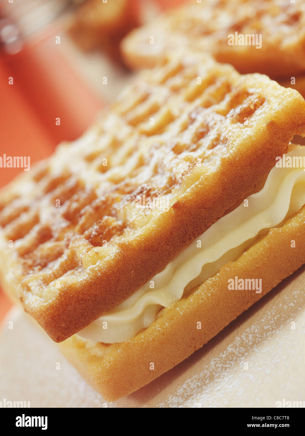 Waffles filled with vanilla cream Stock Photo - Alamy