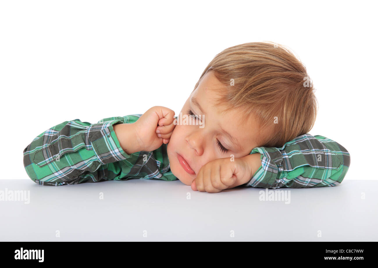 Tired caucasian boy. All on white background Stock Photo - Alamy