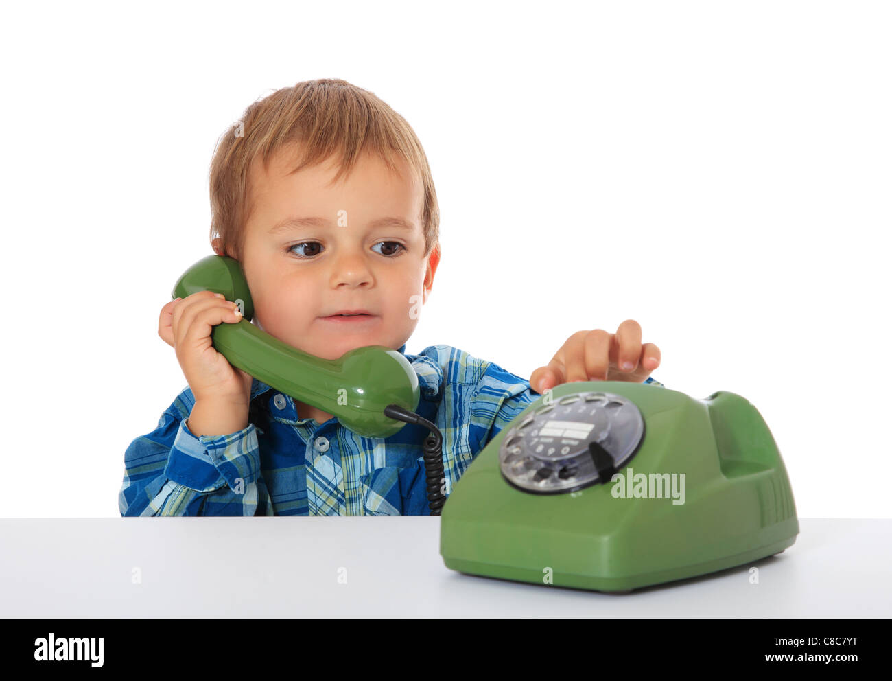 Cute caucasian boy using telephone. All on white background Stock Photo ...