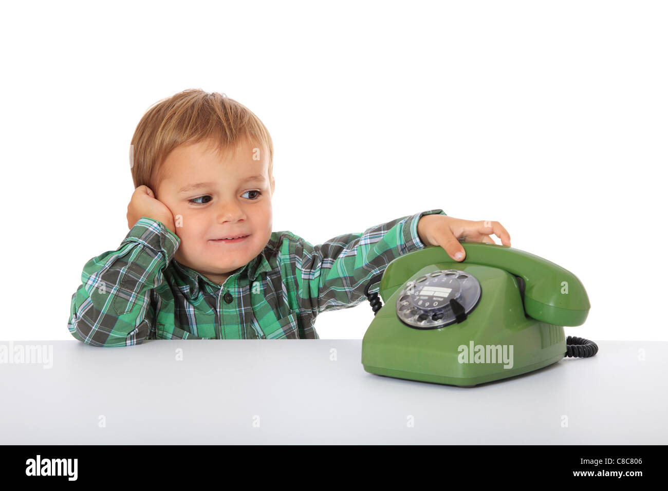 Cute caucasian boy using telephone. All on white background Stock Photo ...