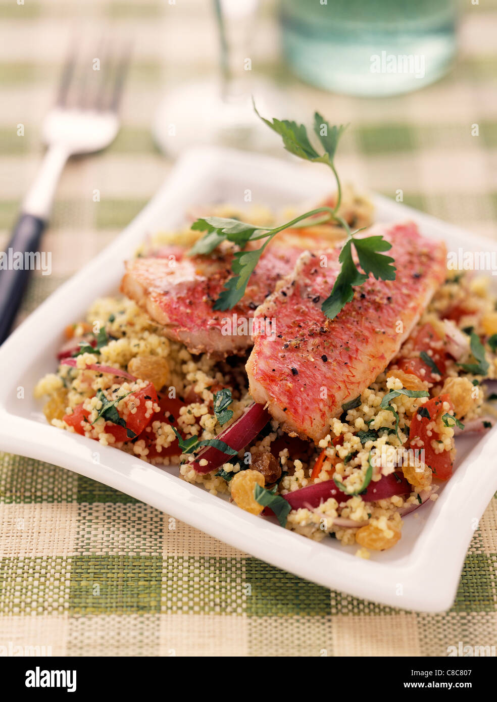 Roasted red mullet with hot spicy tabbouleh Stock Photo - Alamy