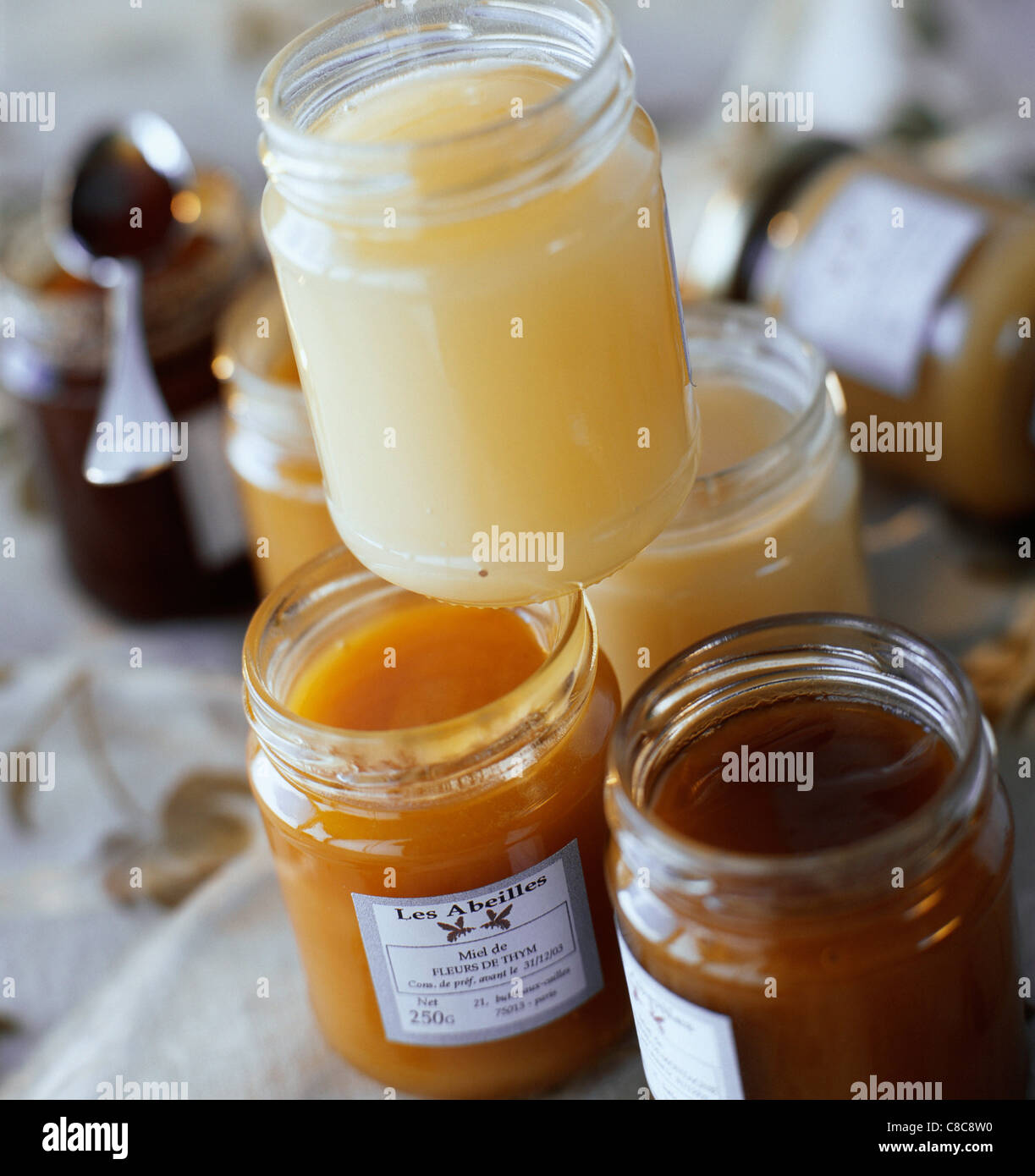 assorted jars of honey Stock Photo - Alamy