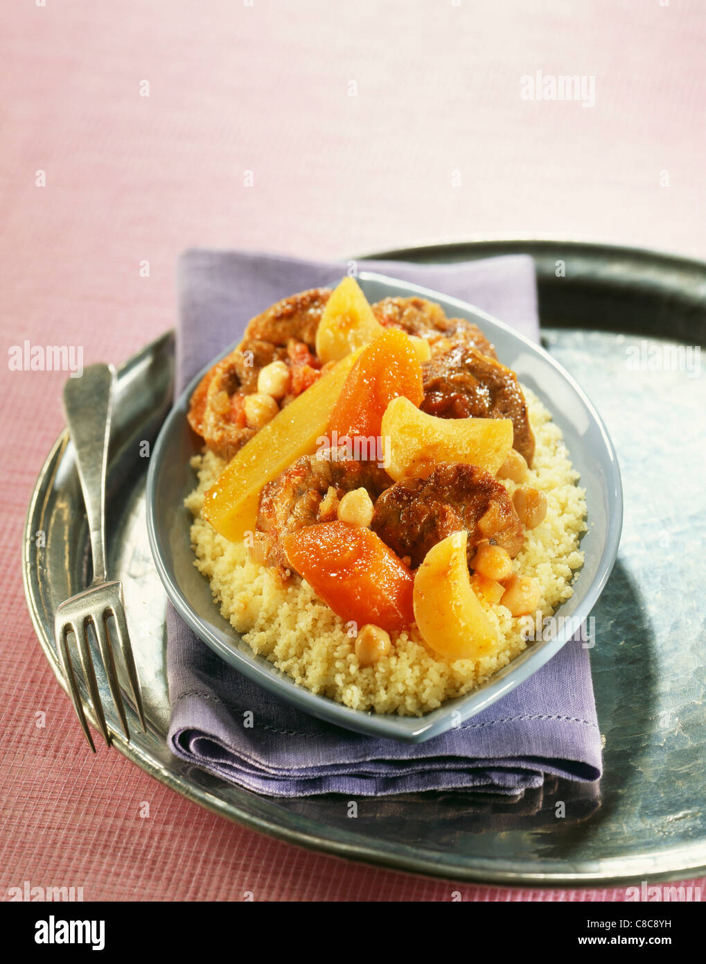 Veal knuckle and vegetable couscous Stock Photo - Alamy