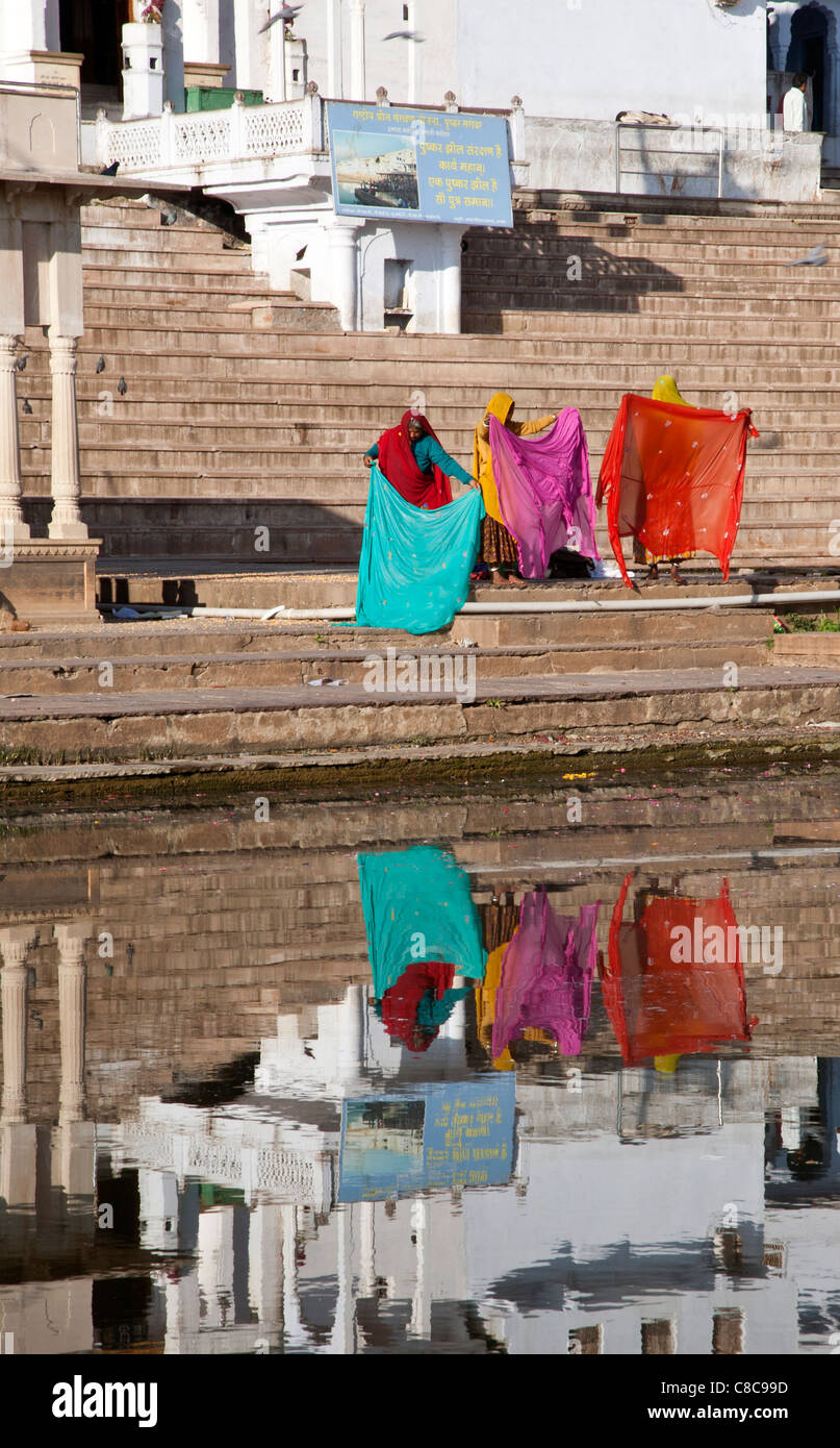 Indian woman drying clothes hi-res stock photography and images - Alamy