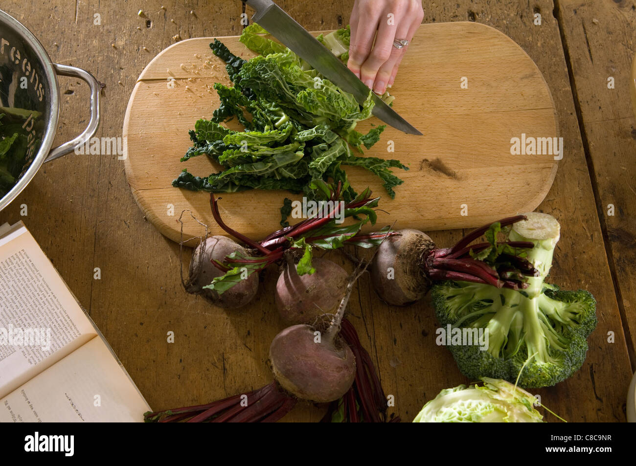 Woman chopping vegetables broccoli hi-res stock photography and images ...