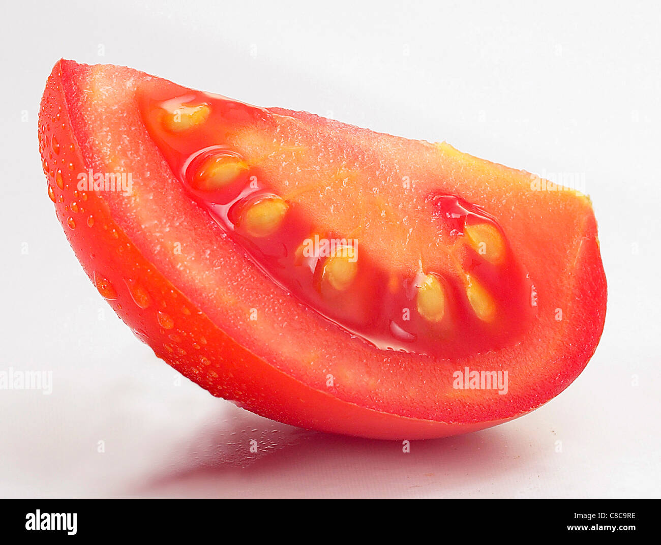 quarter of a tomato Stock Photo - Alamy