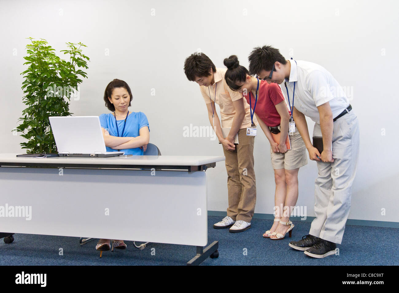 Asian Business People Bowing High Resolution Stock Photography and ...