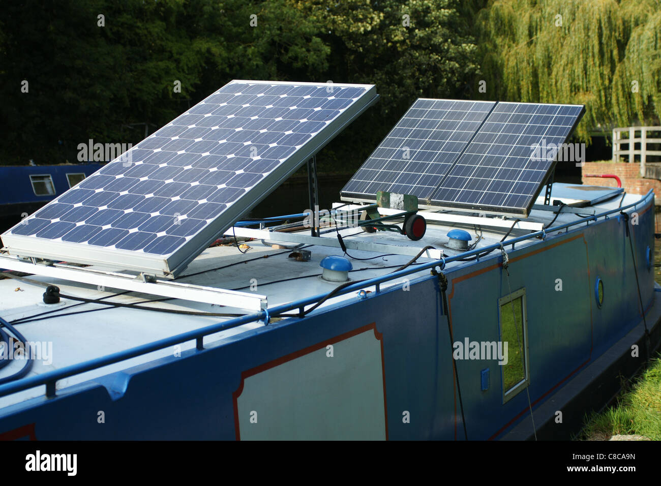 A canal narrowboat with solar panels Stock Photo - Alamy