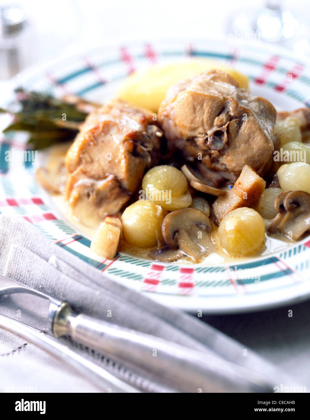 rabbit in white wine Stock Photo - Alamy