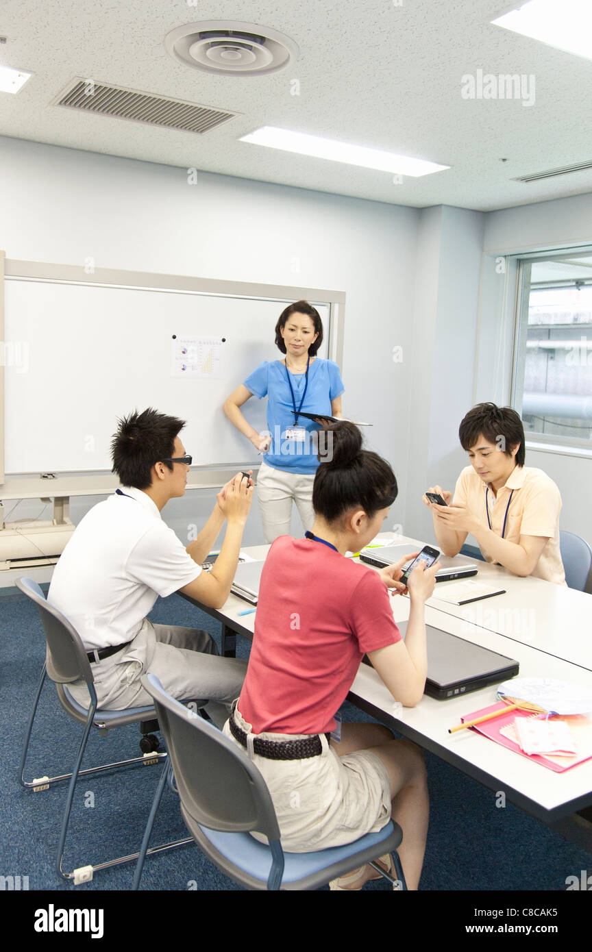 Boss getting angry at staffs playing with Smartphone during meeting ...