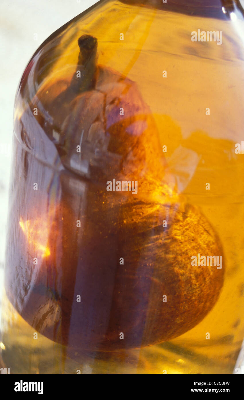 Bottle of pear liqueur Stock Photo - Alamy