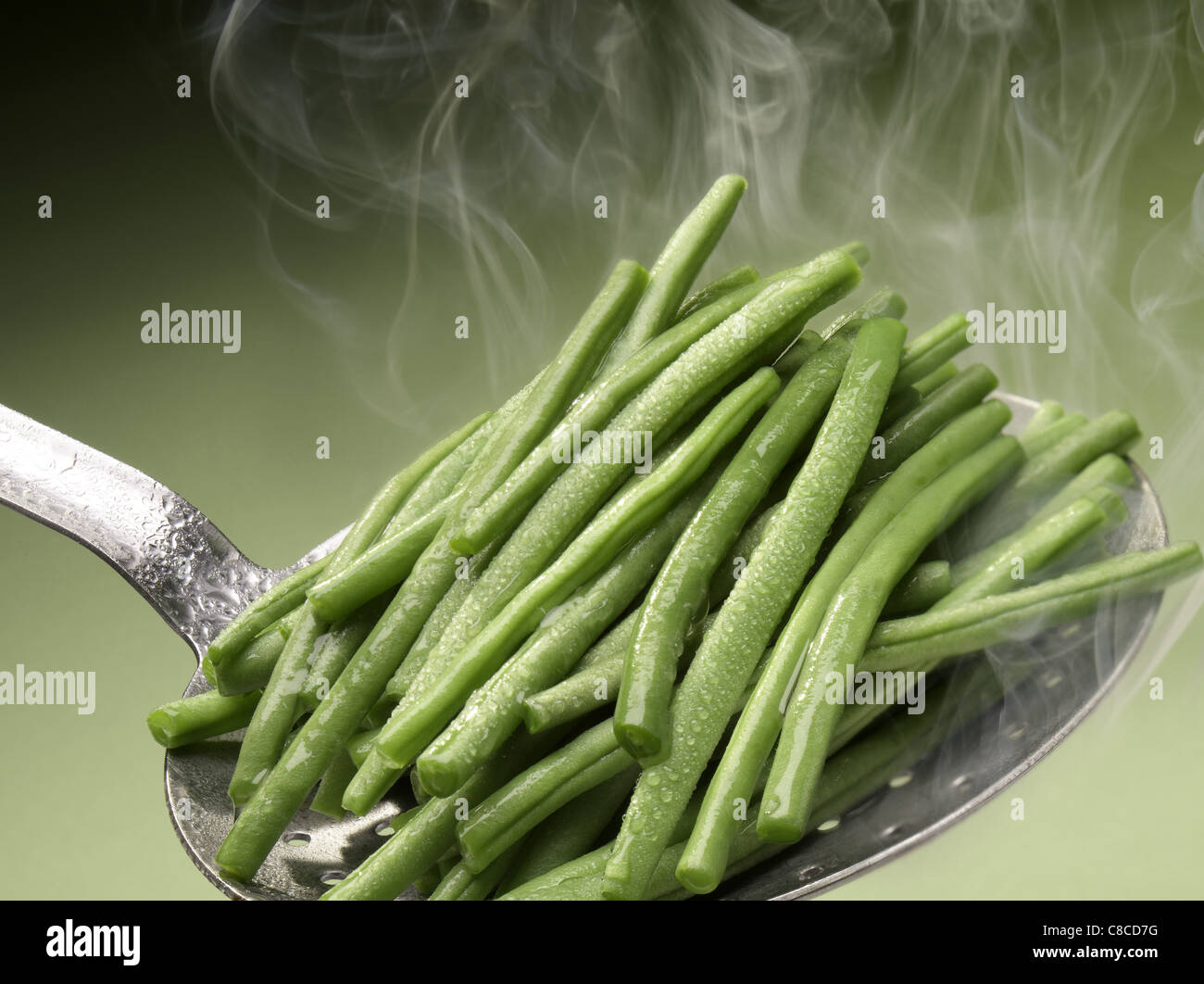 Steam-cooked green beans Stock Photo - Alamy