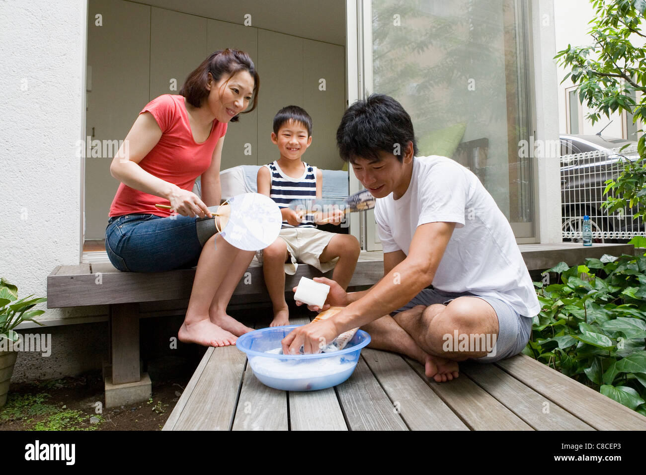 Father washing socks by washboard Stock Photo - Alamy