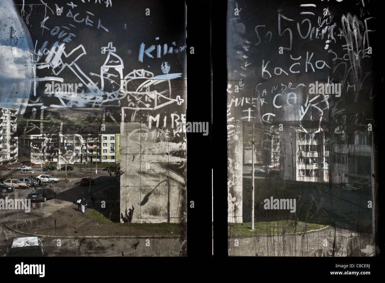 The Gipsy ghetto of Chanov seen through a dirty window in a devastated ...