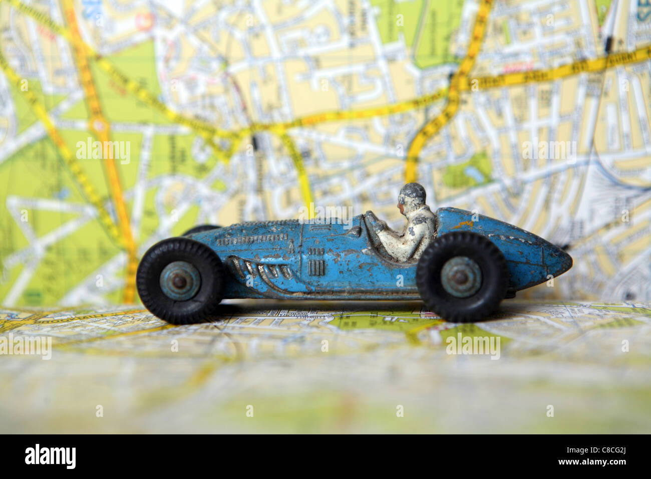 Vintage Dinky Bugatti, racing toy car, with street map as full frame ...