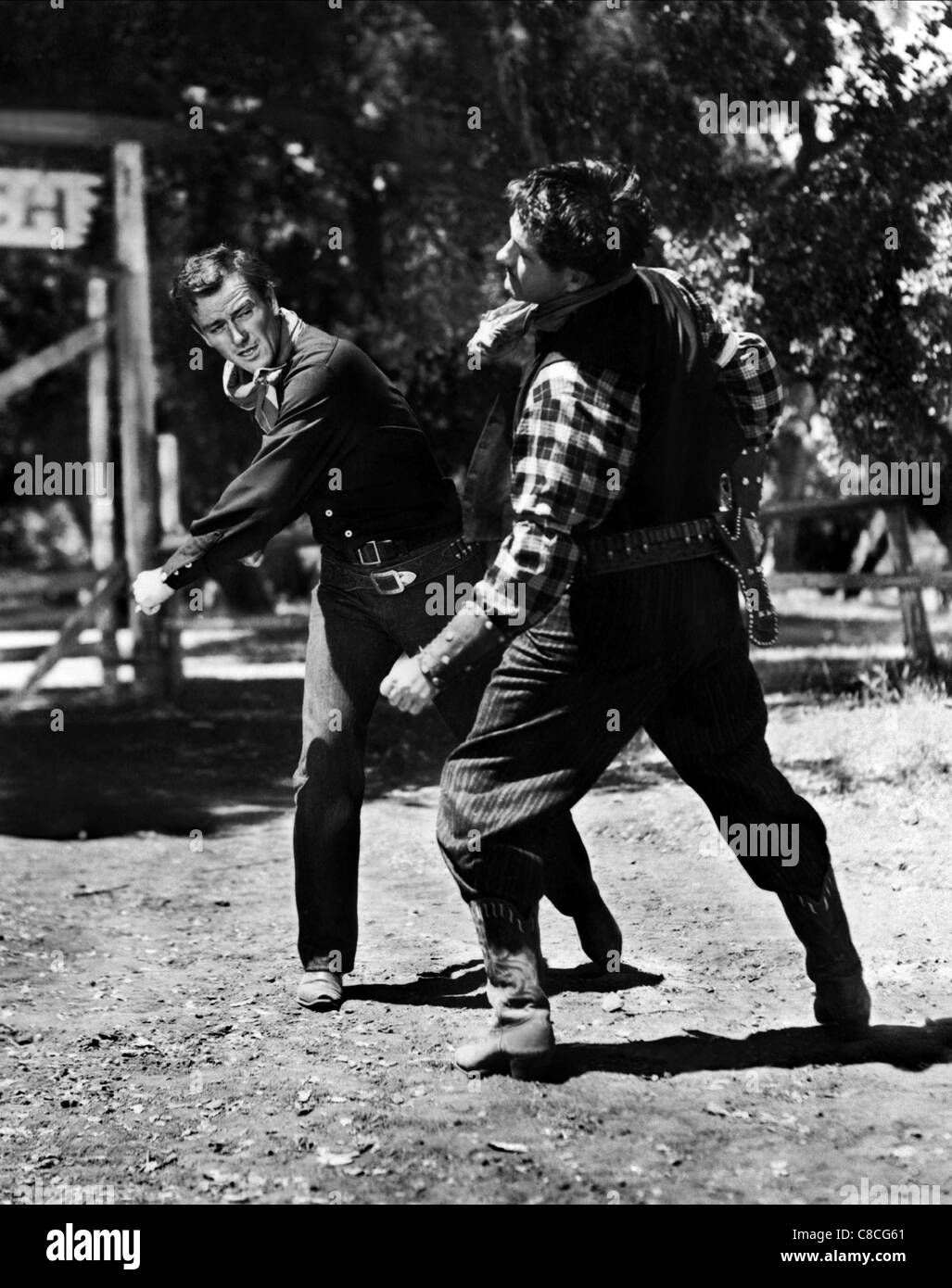 JOHN WAYNE, HARRY WOODS, TALL IN THE SADDLE, 1944 Stock Photo - Alamy