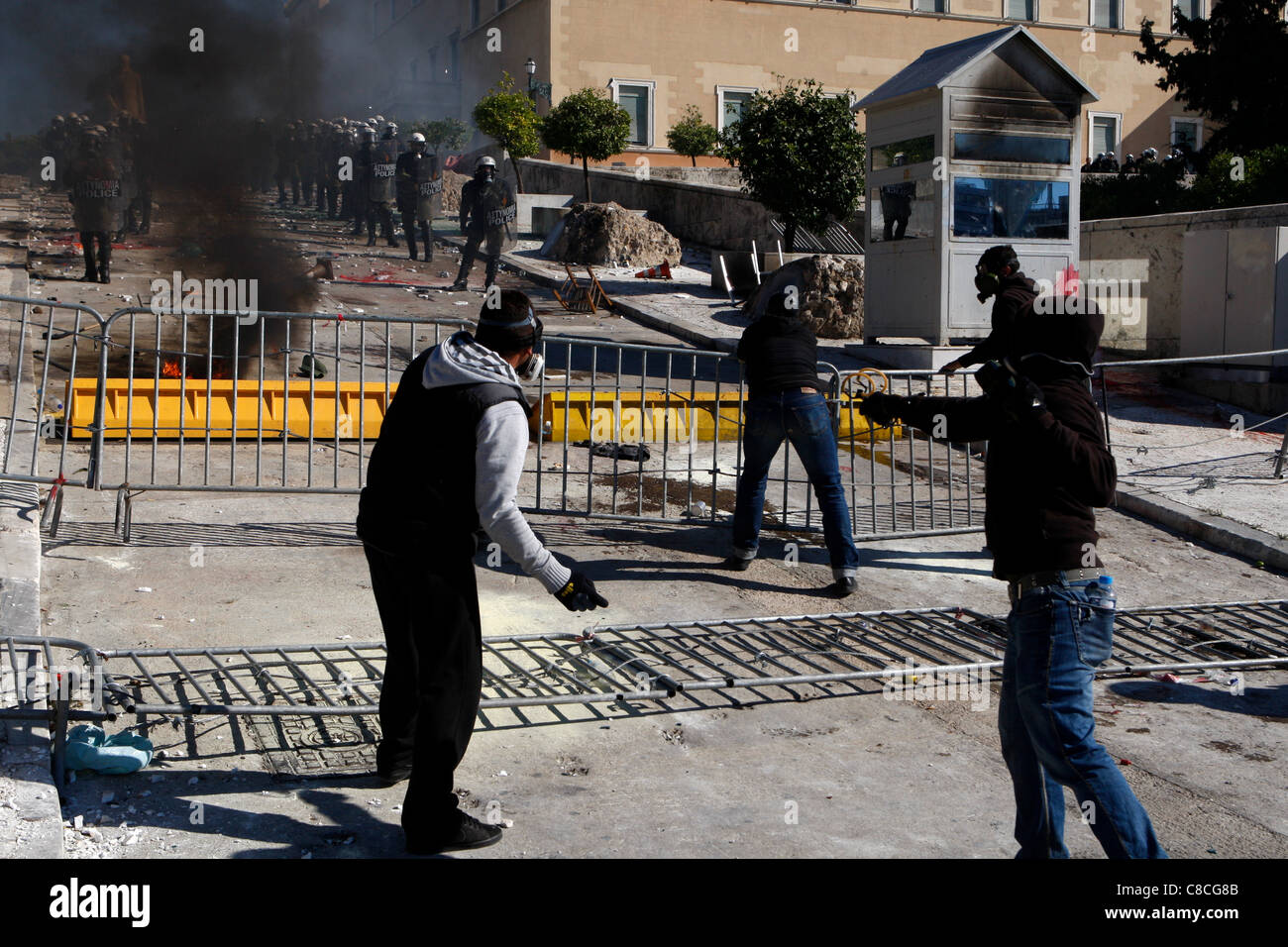 Throw tear gas bombs hi-res stock photography and images - Alamy