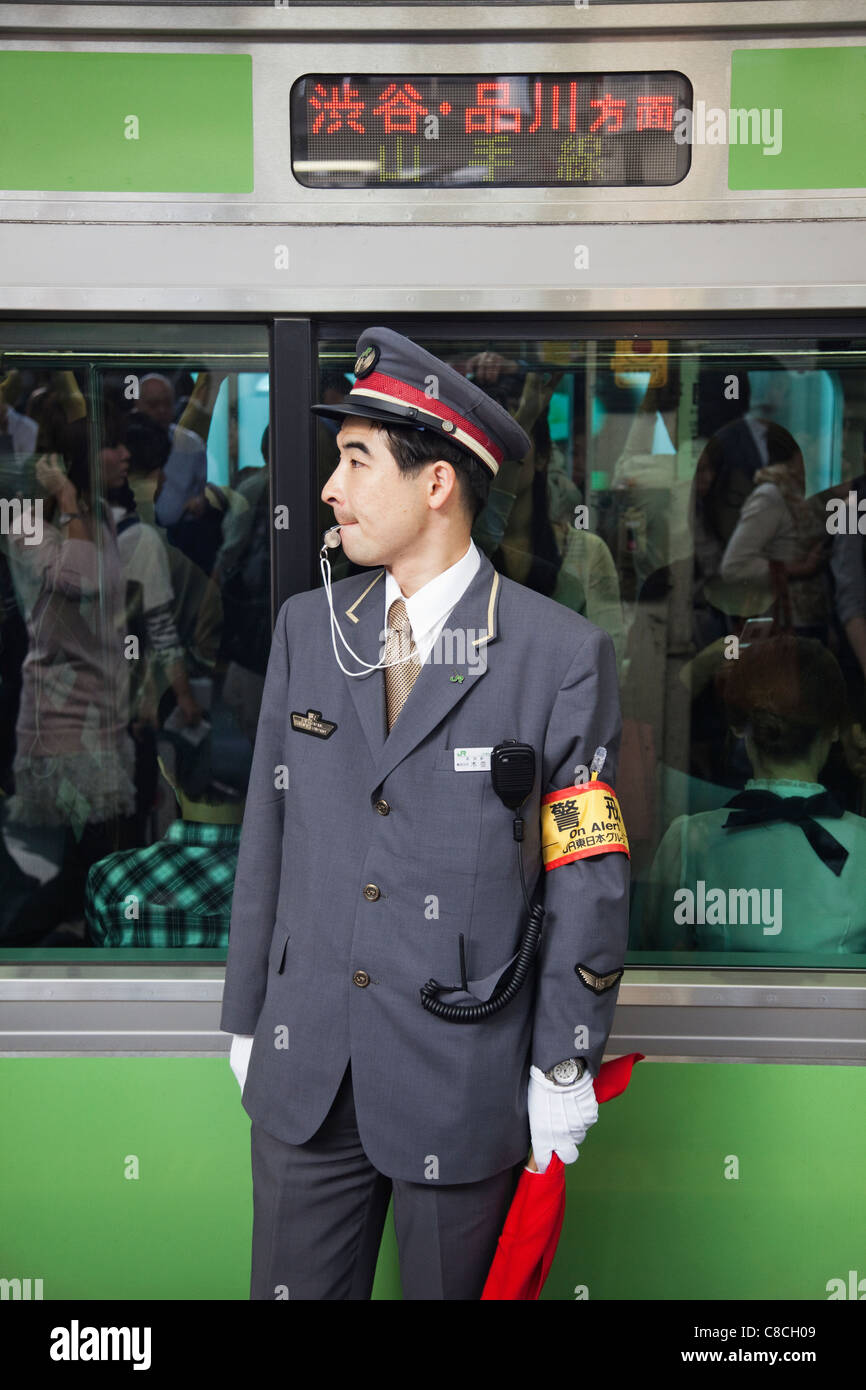 Japan, Tokyo, Shinjuku Railway Station, Platform Guard Stock Photo - Alamy