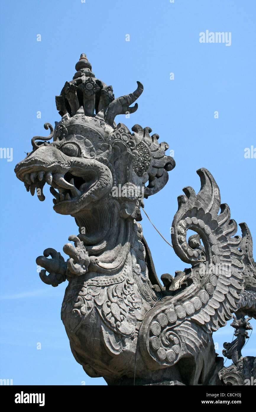 Carved Stone Dragon On A Bali Gate Stock Photo - Alamy