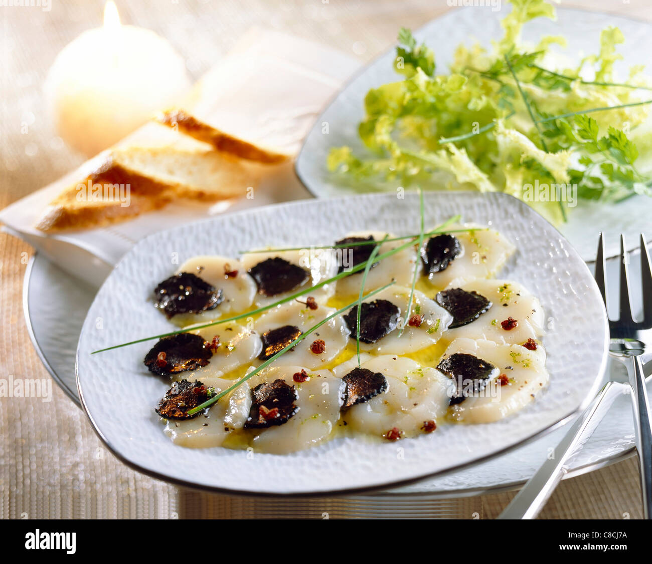 Scallops with truffles Stock Photo - Alamy