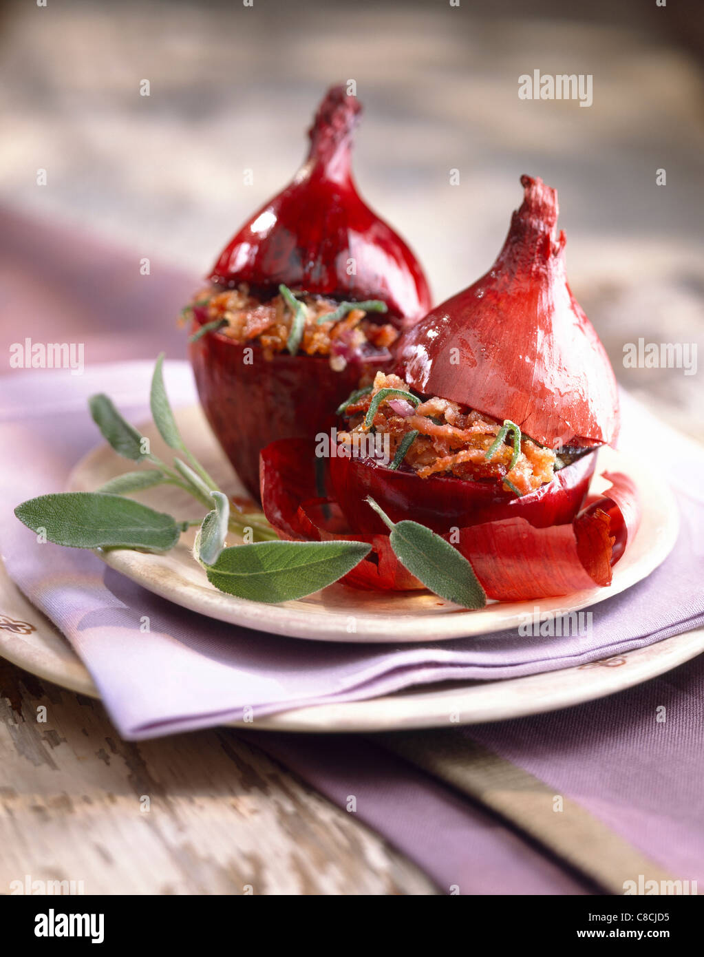 Stuffed red onions Stock Photo - Alamy