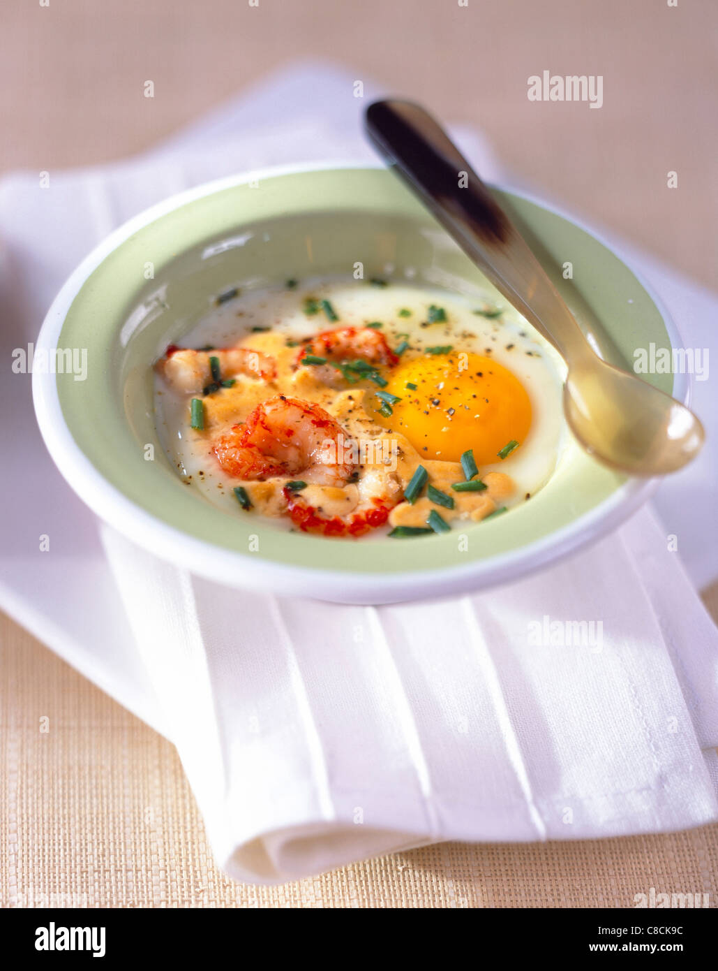 Coddled eggs with crayfish and chives Stock Photo - Alamy