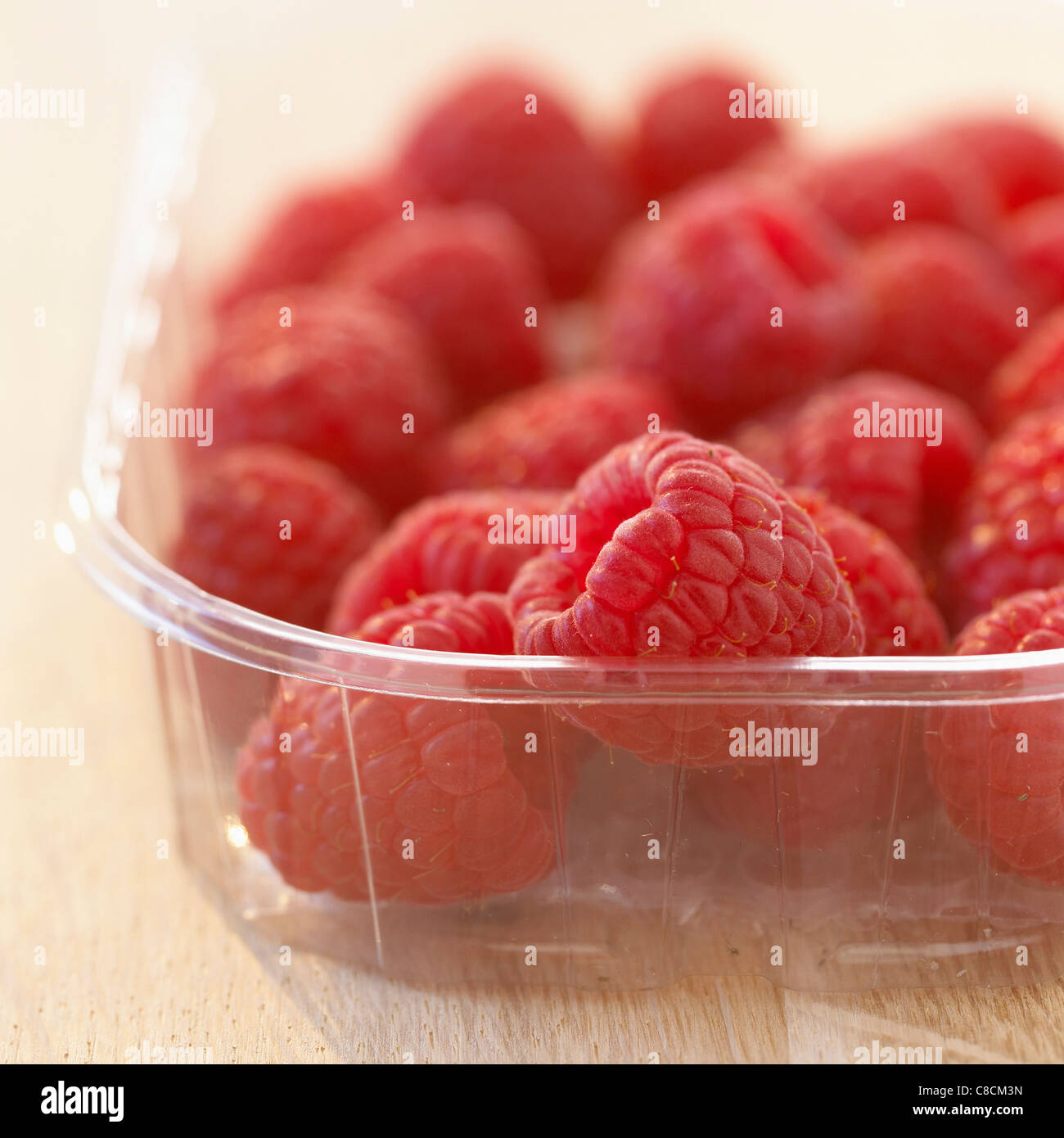 punnet of raspberries Stock Photo - Alamy