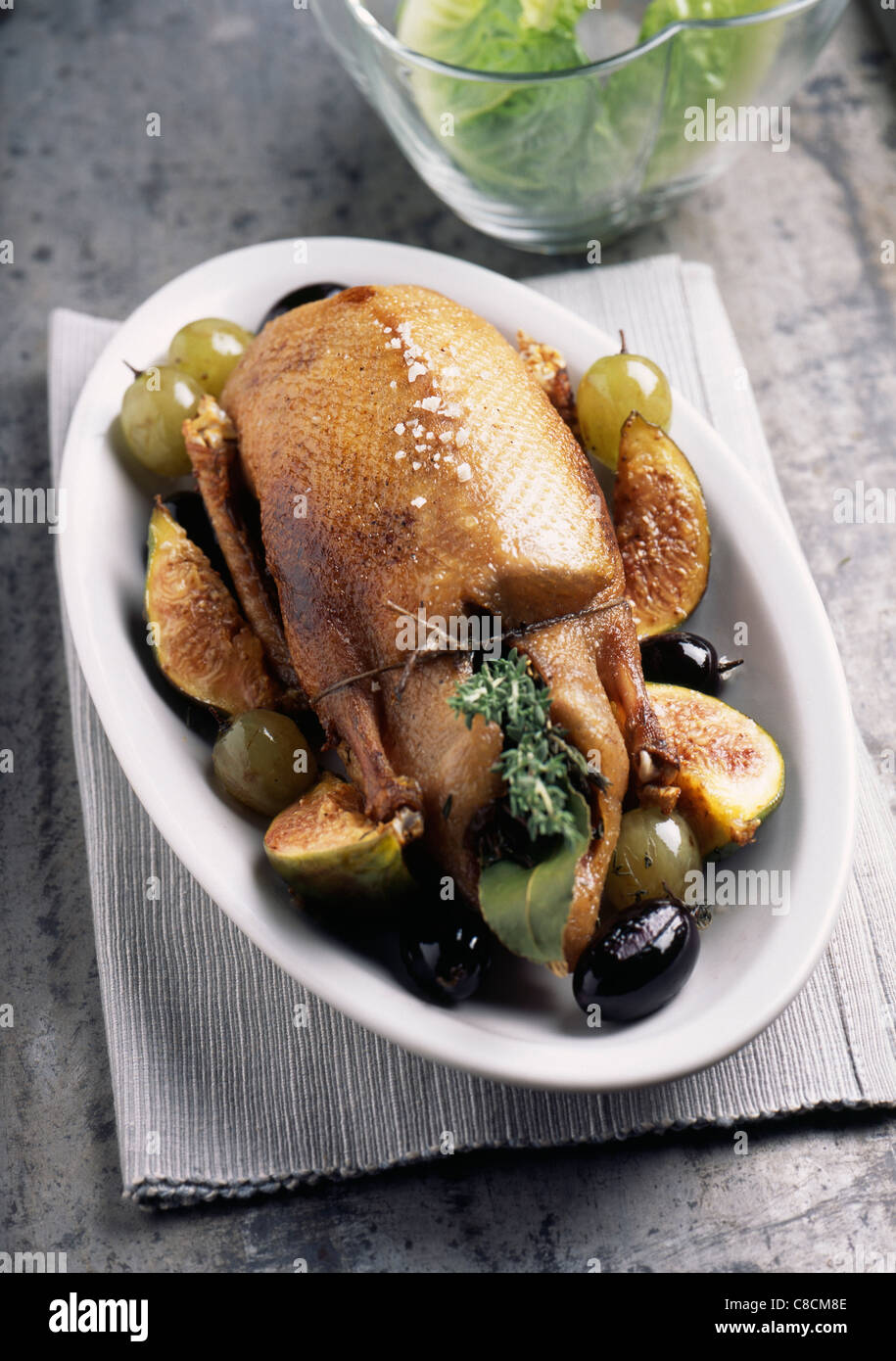 Whole roast duck with figs and raisins Stock Photo - Alamy