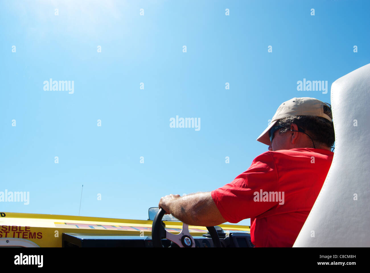 Man driving speed boat hi-res stock photography and images - Alamy