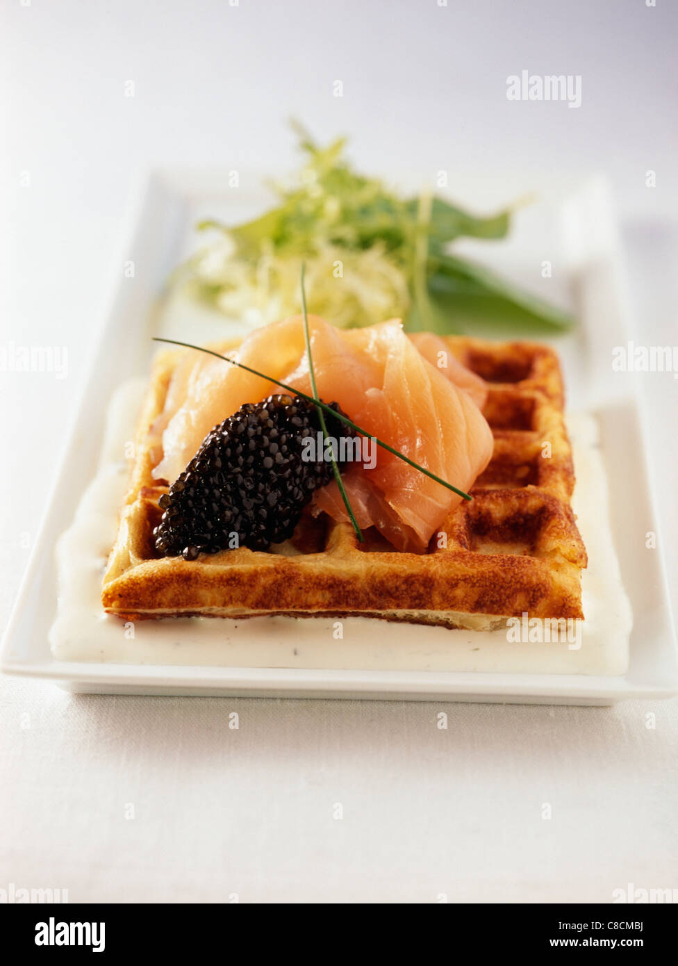 Waffle with caviar Stock Photo - Alamy