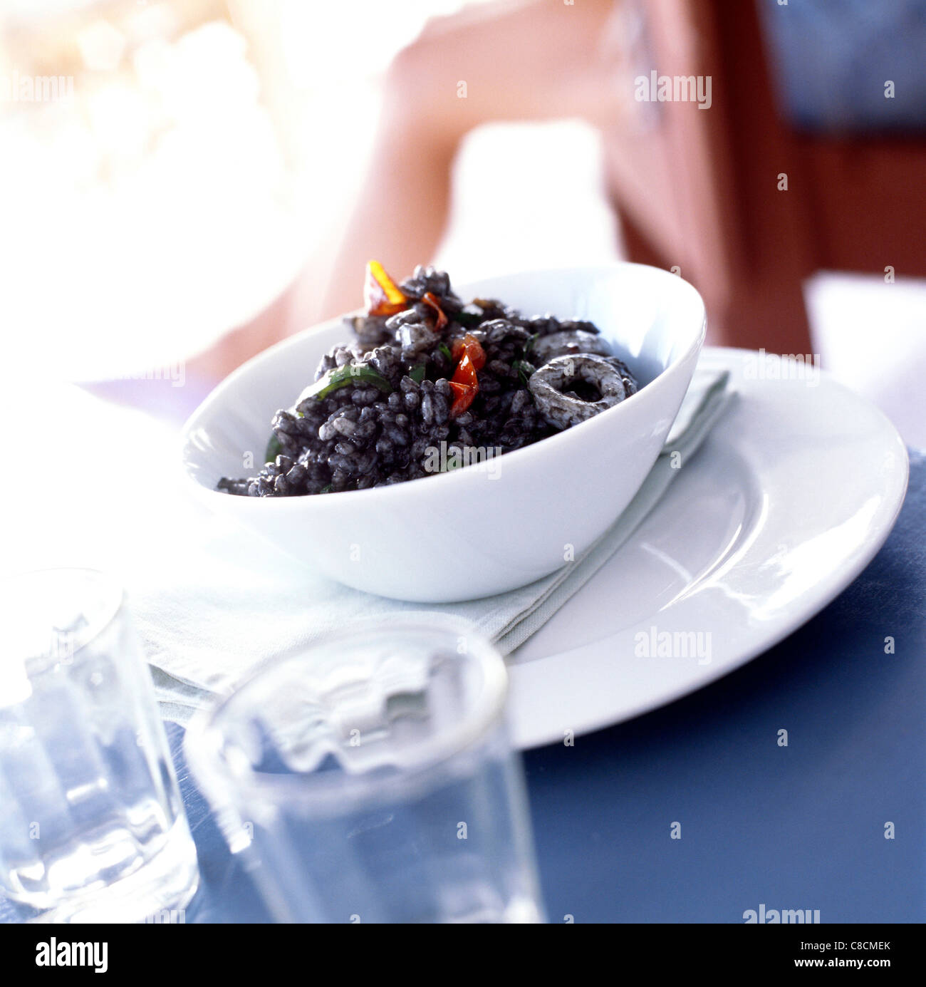Rice with cuttlefish ink Stock Photo - Alamy