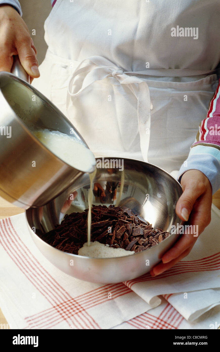 Preparing chocolate Ganache Stock Photo - Alamy