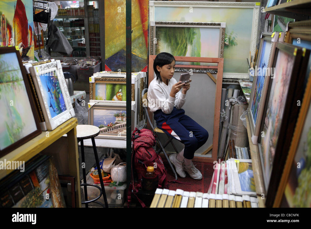 young girl child in art shop / gallery, Wan Chai, Hong Kong, China ...