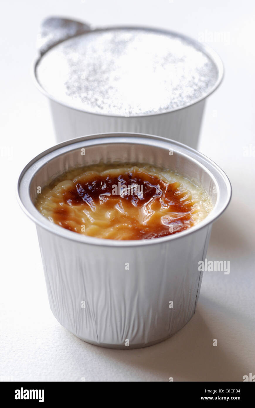 Pots of baked egg cream Stock Photo - Alamy