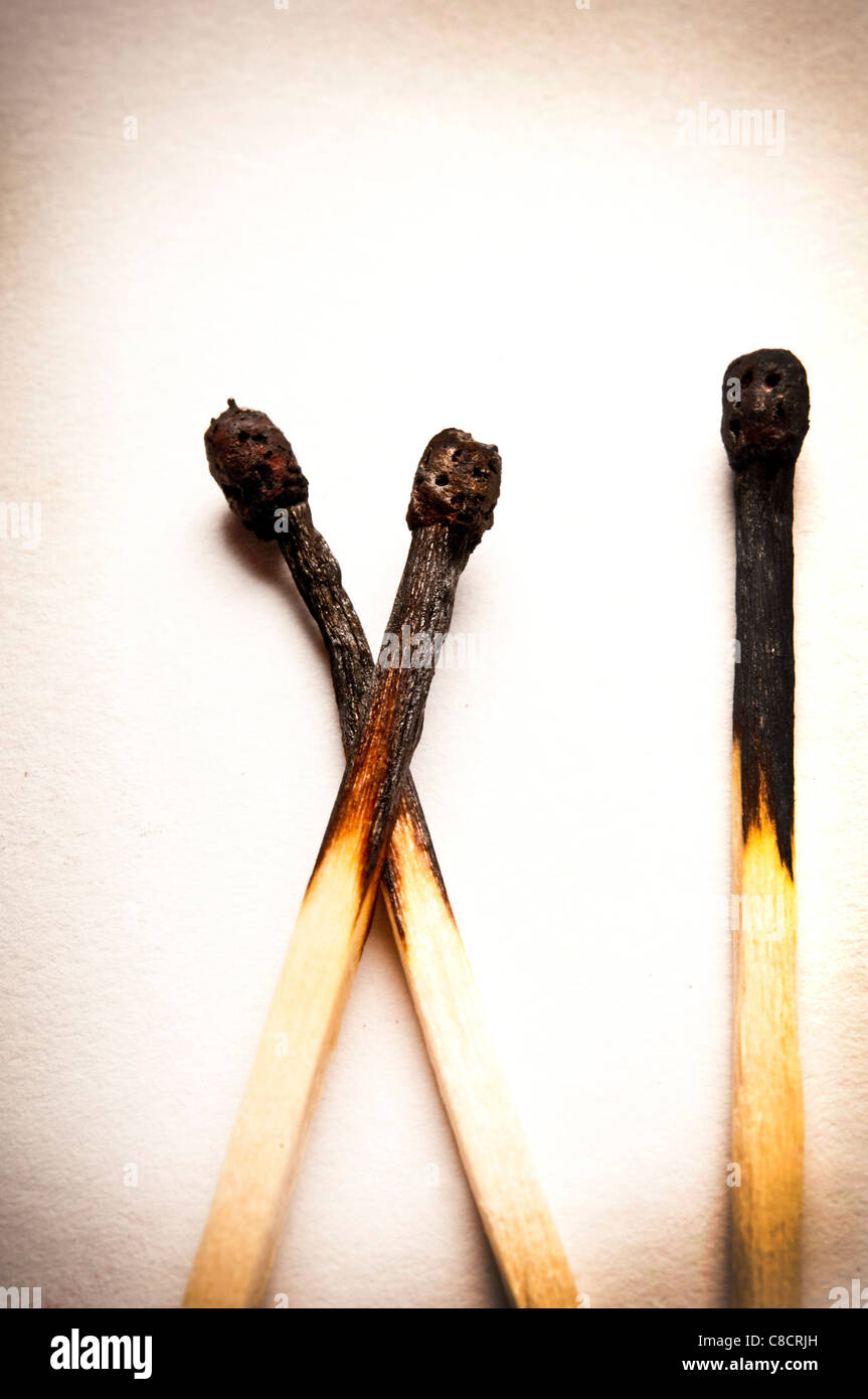 three burnt matches Stock Photo - Alamy