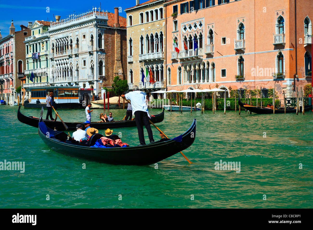 Venice Italy riding in gondola and traghetto on Grand Canal Stock Photo ...