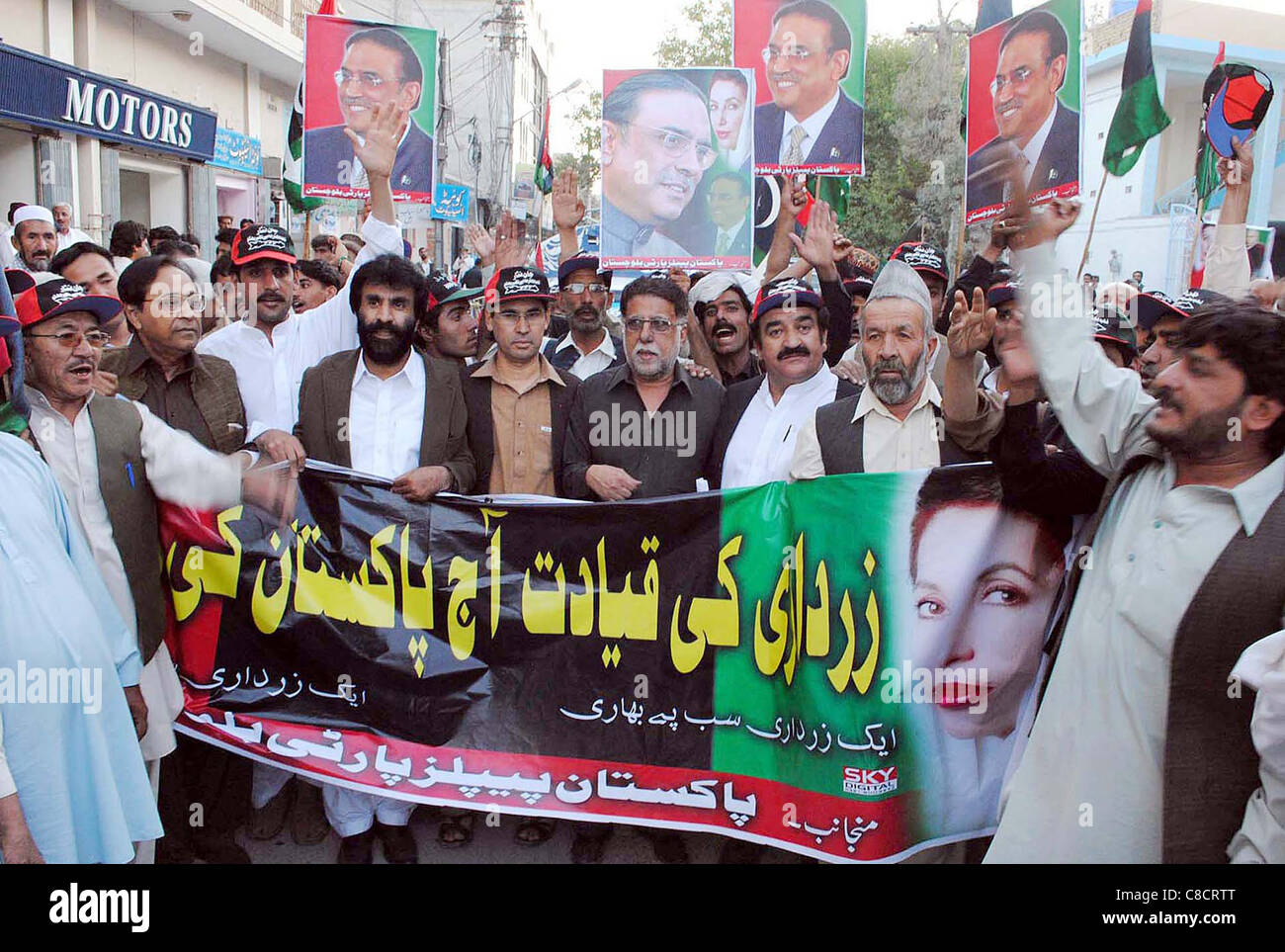 Leaders and supporters of Peoples Party (PPP) chant slogans in favor of ...