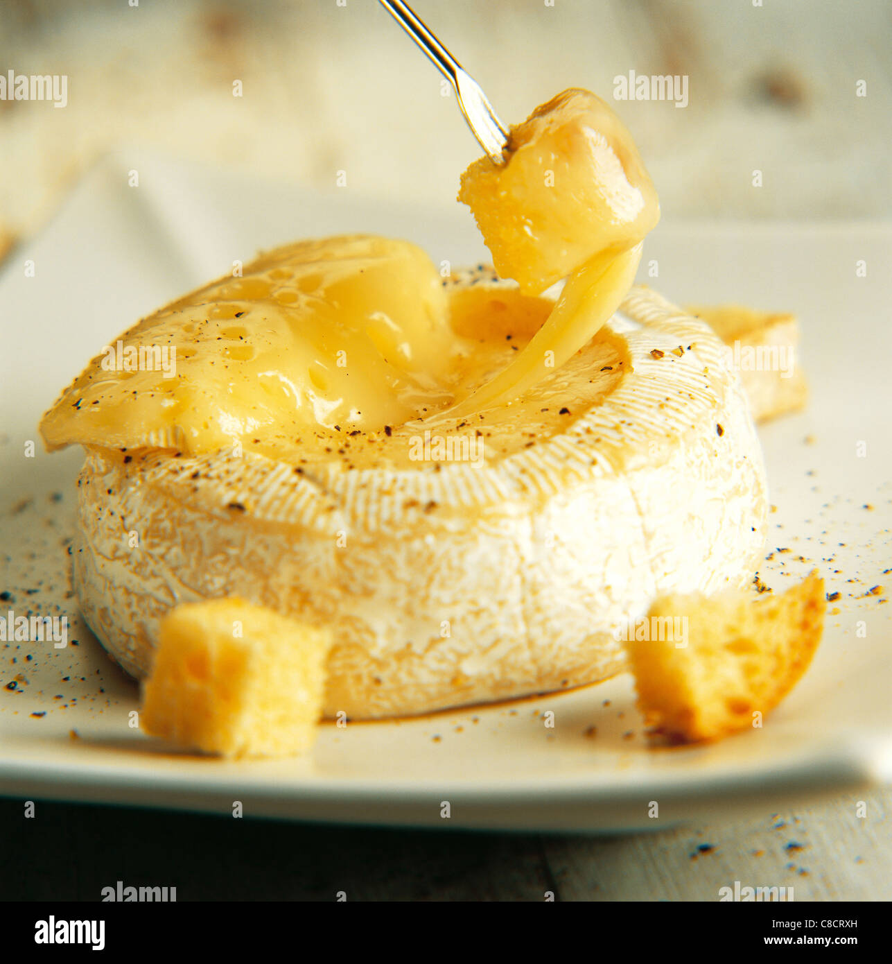 Melted goats cheese hi-res stock photography and images - Alamy