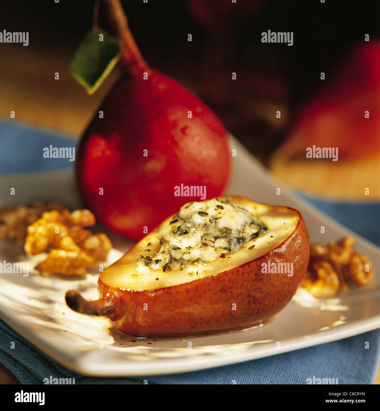 Red pears filled with cheese Stock Photo - Alamy