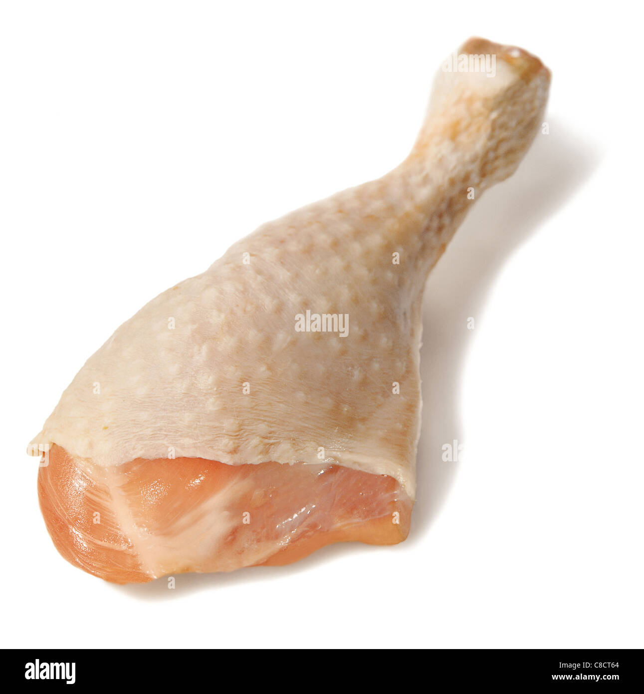 Raw chicken leg Stock Photo - Alamy