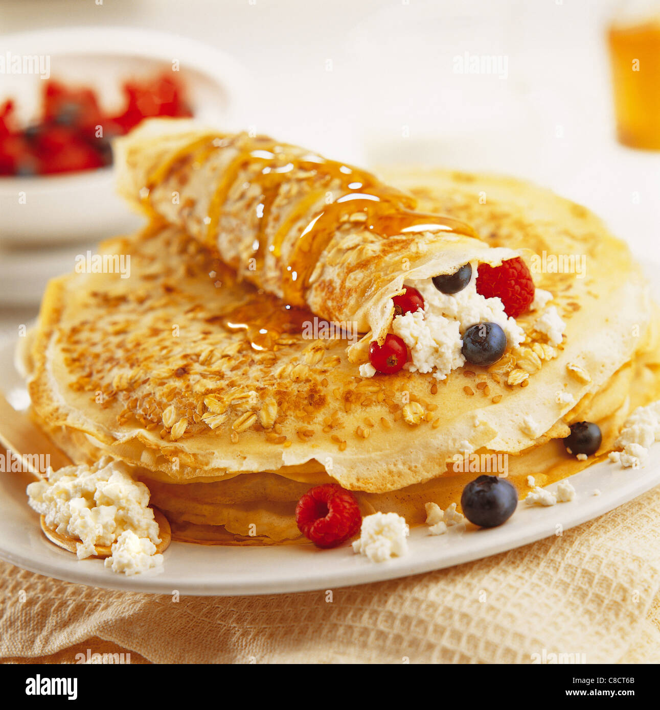 Crepes filled with fruit and cheese Stock Photo - Alamy