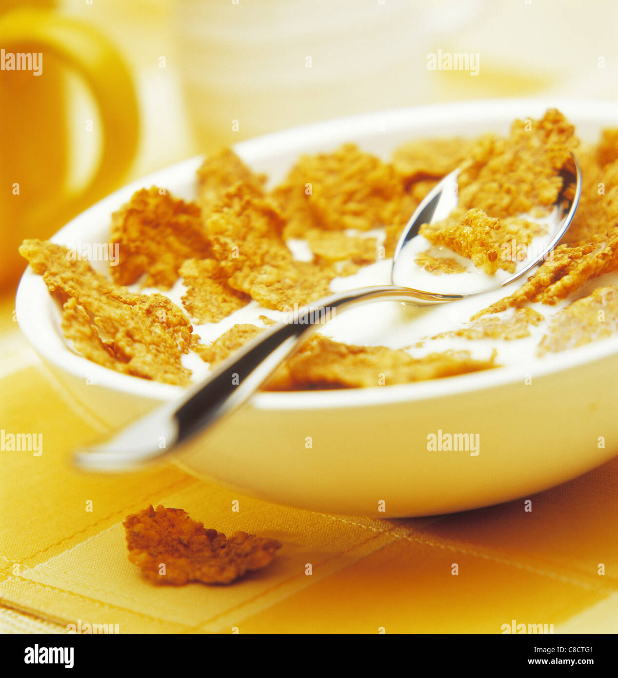 Bowl of cereal with milk and spoon Stock Photo - Alamy