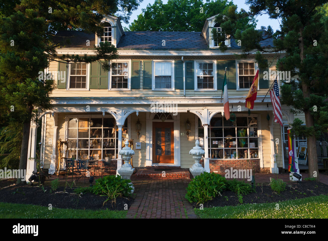 Two story store/house with front porch Stock Photo - Alamy