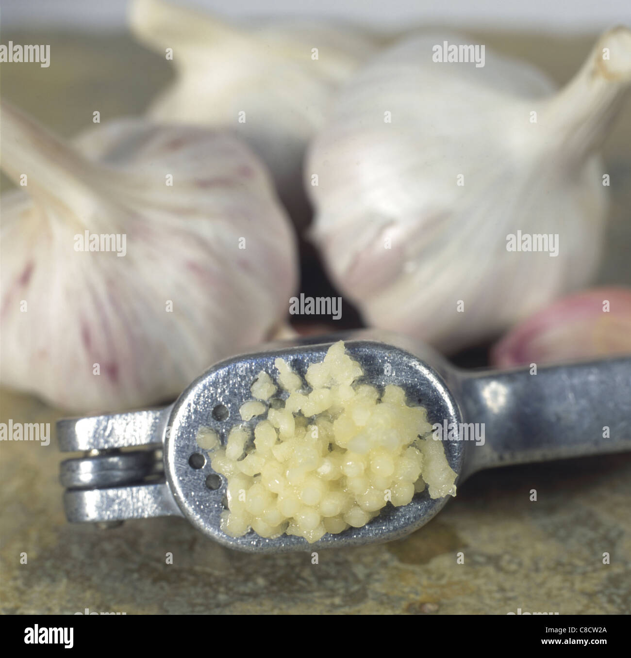 Crushed garlic cloves hi-res stock photography and images - Alamy