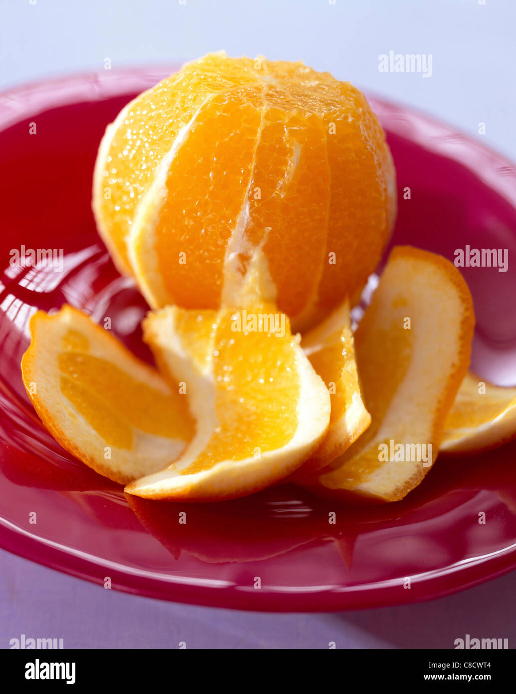 Child peeling orange hi-res stock photography and images - Alamy