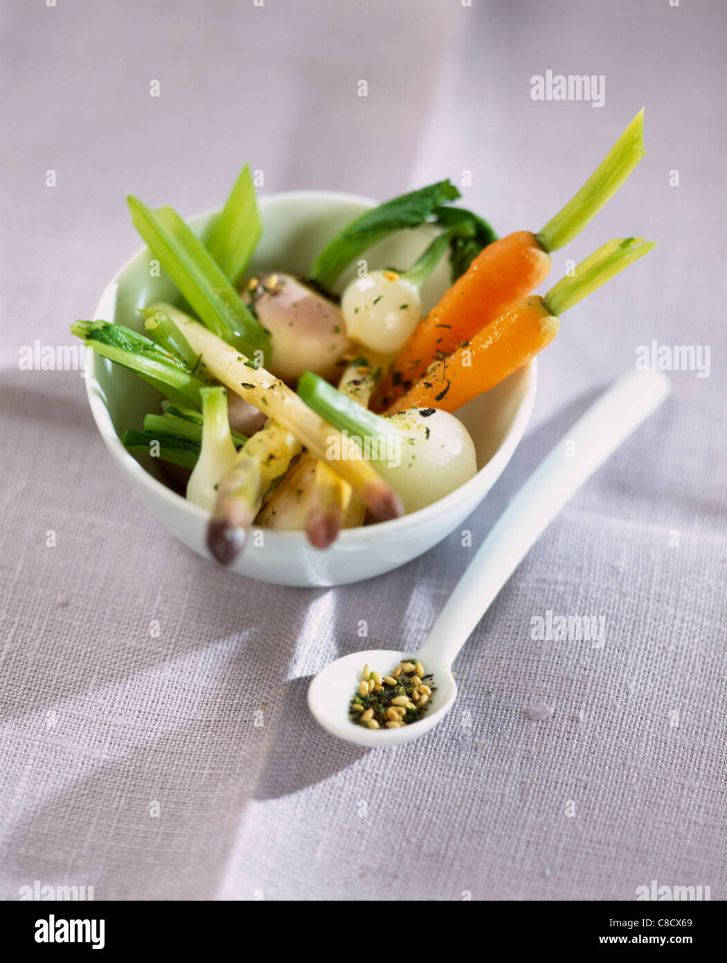 Crunchy vegetables with sesame seeds and green tea Stock Photo - Alamy