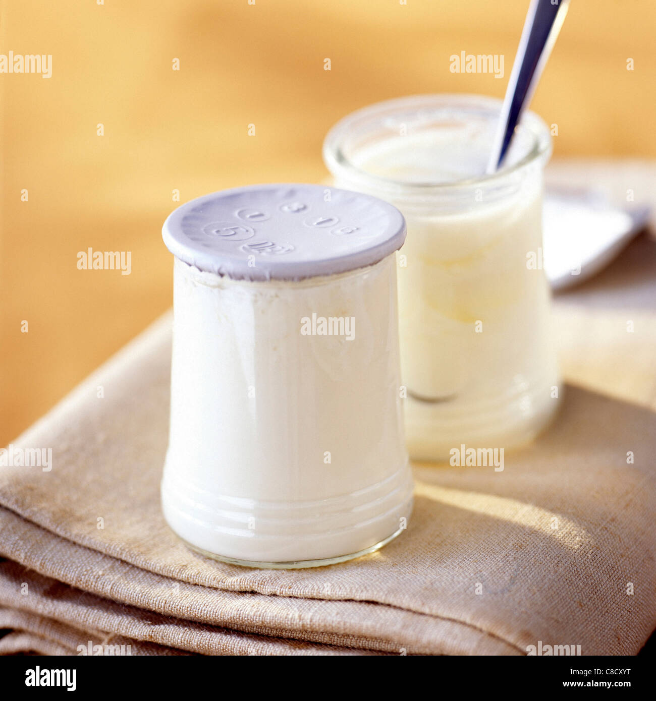 glass pots of plain yoghurt Stock Photo - Alamy